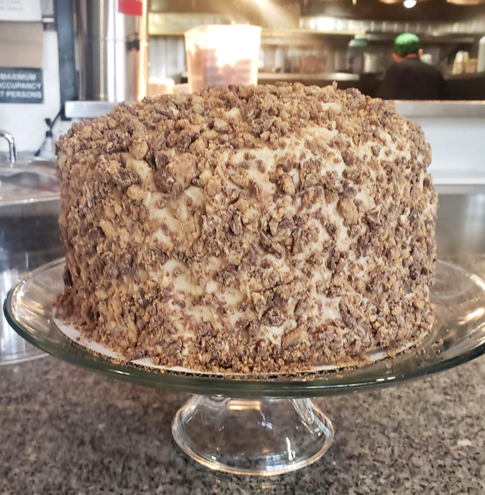This isn't just cake—it's an architectural marvel of crumbs and frosting. The kind of dessert that makes you consider skipping the main course entirely.