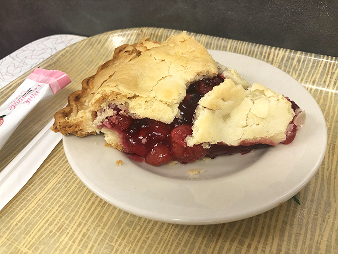 Pie that would make your grandmother simultaneously proud and jealous. That cherry filling isn't just fruit&mdash;it's summer captured in a perfect golden crust.