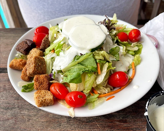 Even the house salad gets the coastal treatment &ndash; fresh greens providing a crisp counterpoint to all that glorious fried goodness.