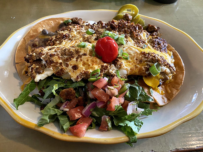 When breakfast can't decide between Mexico and America, you get this glorious plate where eggs, cheese, and tortilla live in perfect harmony.