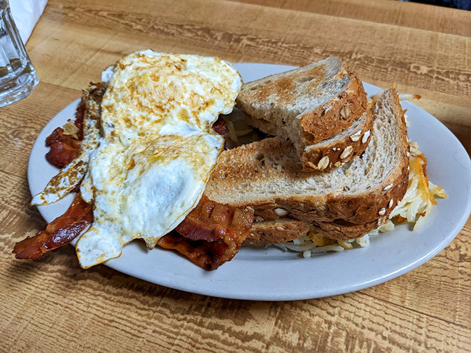 The Huron Sampler isn't just breakfast—it's a diplomatic summit of morning favorites negotiating deliciously on a single plate.