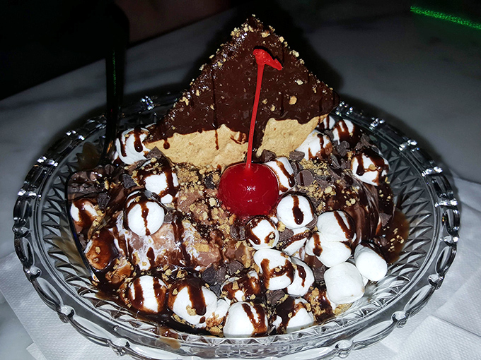 This isn't just a sundae, it's an architectural marvel! Layers of ice cream, toppings, and chocolate create a dessert skyscraper that demands to be demolished.