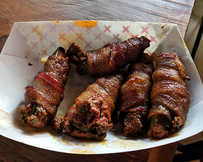 Bacon-wrapped jalape&ntilde;o poppers that deliver that perfect one-two punch: smoky-crisp exterior giving way to a creamy, spicy interior. Resistance is futile.