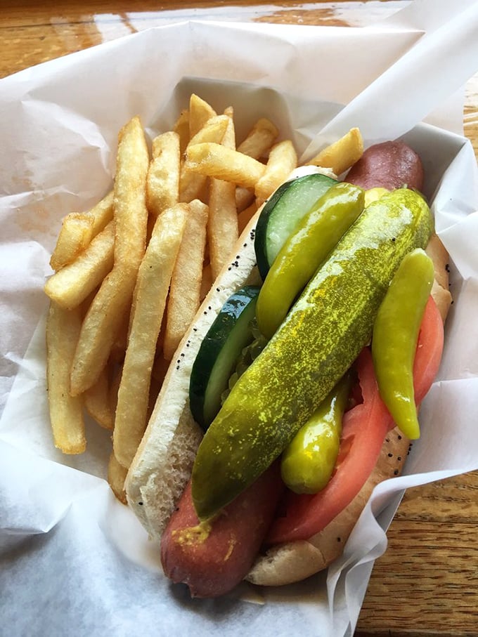 The Chicago dog in its natural habitat, surrounded by perfectly crisp fries. This isn't just lunch; it's a cultural institution on a poppy seed bun.
