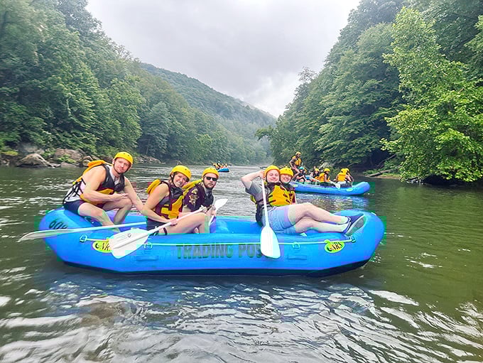 River rafting: where strangers become family after the first rapid. These smiles say everything about the Youghiogheny's perfect blend of thrill and beauty.