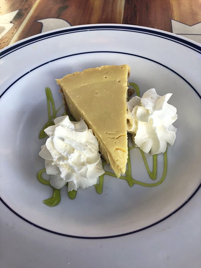 Key lime pie that strikes the perfect balance between tart and sweet, with whipped cream dollops that look like little clouds having the best day ever.