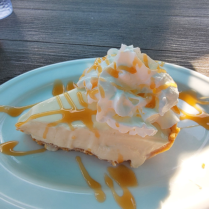 Key lime pie that strikes the perfect balance between sweet and tart. That cloud of whipped cream and caramel drizzle? Just showing off at this point.