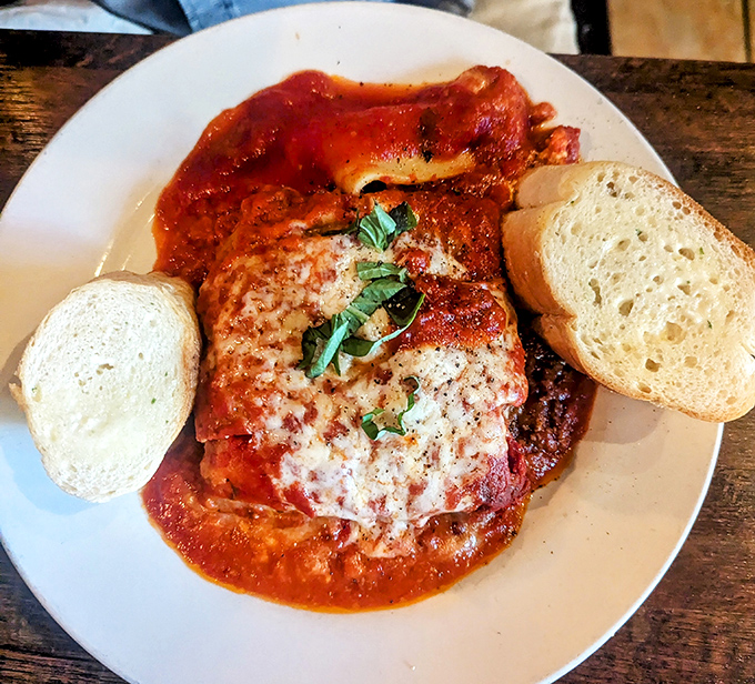 Layers of comfort in every bite. This chicken parmesan isn't just dinner&mdash;it's edible therapy after a long day at the beach.