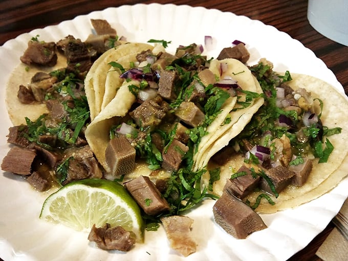 Lengua tacos for the adventurous eater. Tender beef tongue proves that sometimes the most authentic choices deliver the most rewarding flavor experiences.