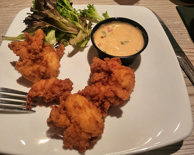 These golden-fried morsels come with a sauce so good you'll be tempted to drink it straight&mdash;restraint recommended, spoons provided.