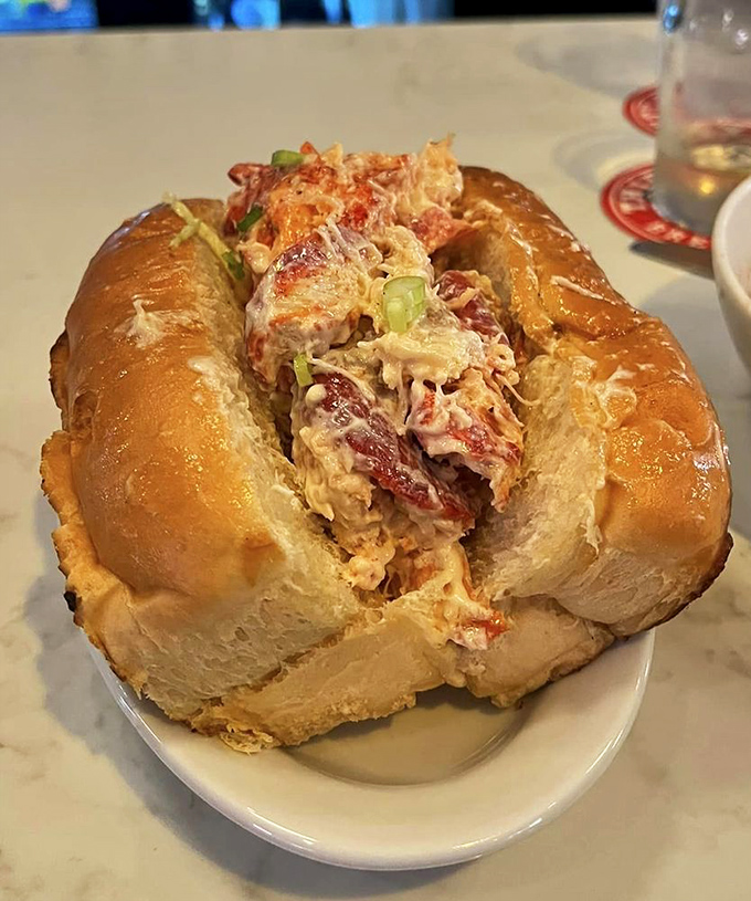 A proper lobster roll that would make a Mainer do a double-take, overflowing with perfectly dressed seafood on a buttery, toasted roll.