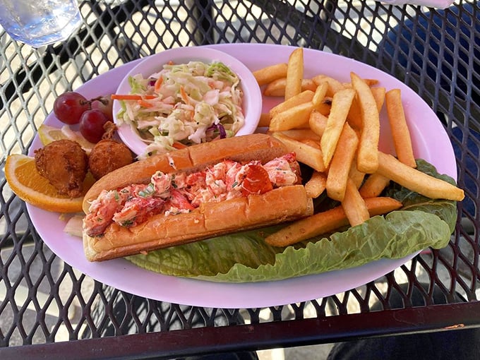 A lobster roll that belongs in the Seafood Hall of Fame. Fresh, vibrant, and served with the kind of fries that disappear mysteriously fast.