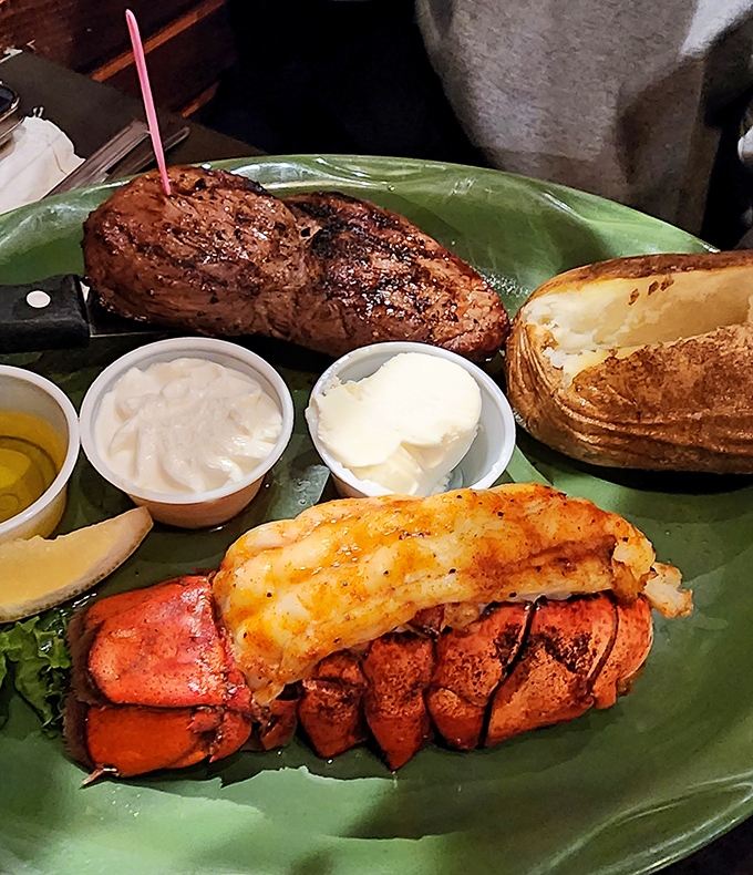 Surf and turf done right&mdash;where the lobster isn't just an afterthought but a co-star with that perfectly charred steak. Potato for scale, and for deliciousness.