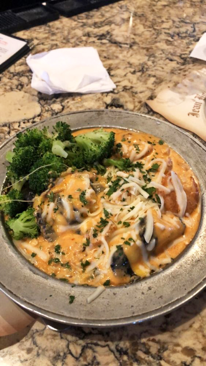 These lobster ravioli swim in a sauce so good you'll want to request a straw. Paired with broccoli for the illusion of healthfulness.
