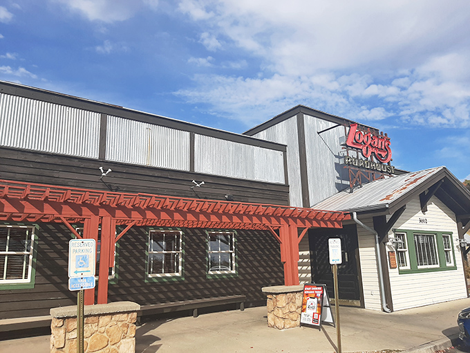 Logan's Roadhouse beckons hungry travelers with its rustic exterior and promise of hearty meals that stick to your ribs like good Midwestern memories.