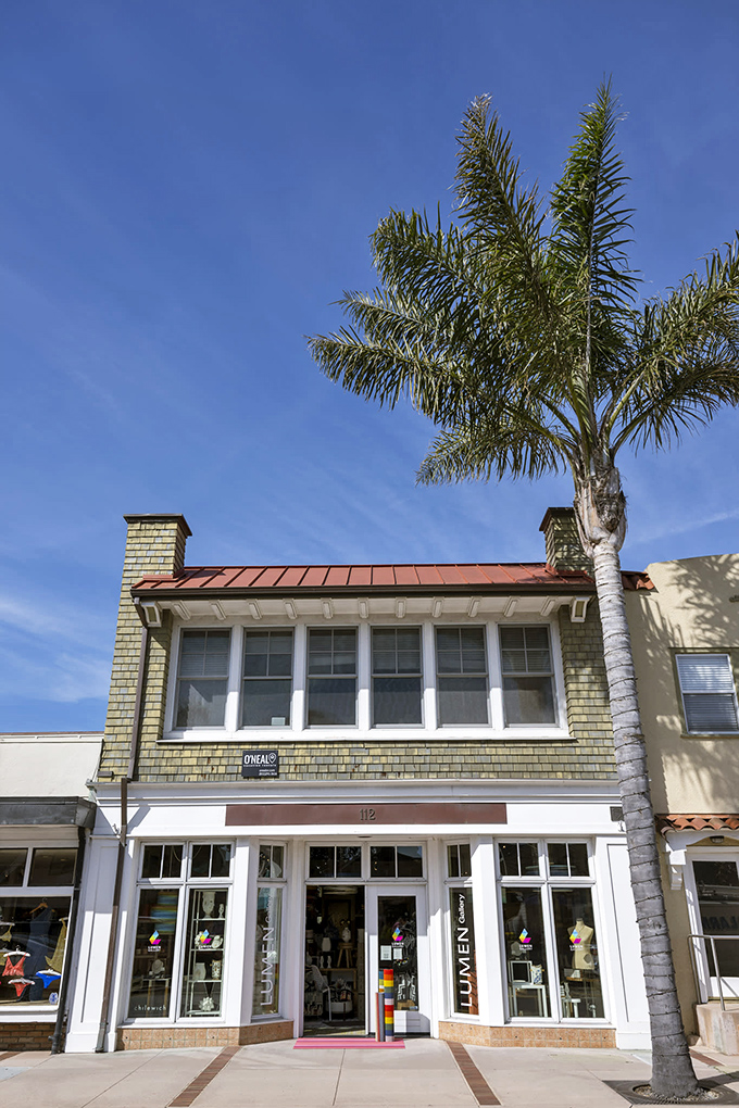 Behind those palm-framed windows at Lumen Gallery, local artistry awaits &ndash; proving beauty in Capitola extends far beyond its famous beaches.