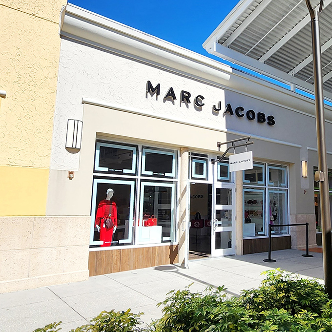 Marc Jacobs' clean white storefront pops with a splash of red, like finding an unexpected exclamation point in the middle of a shopping sentence.