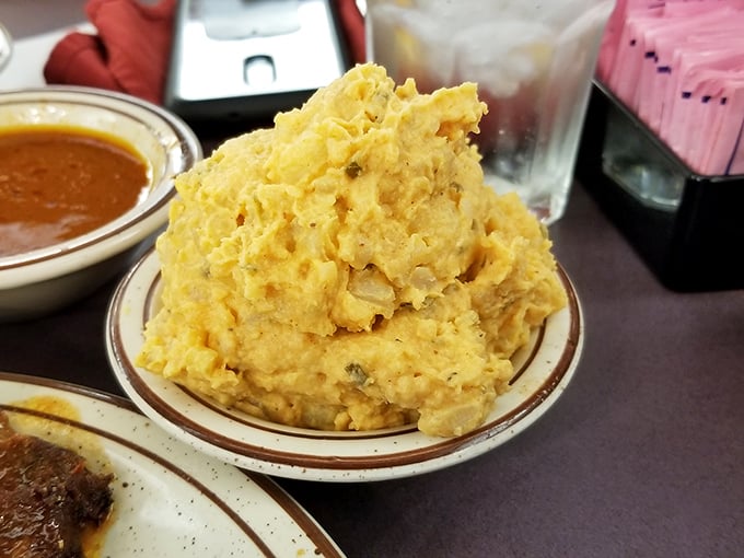 These mashed potatoes weren't just whipped &ndash; they were sweet-talked into creamy submission. Comfort food architecture at its finest.