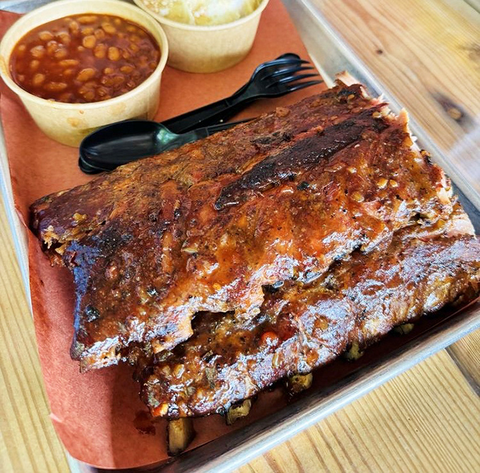 Ribs with a bark so perfect they deserve their own trophy. The smoke ring tells a story of patience that fast food could never understand.