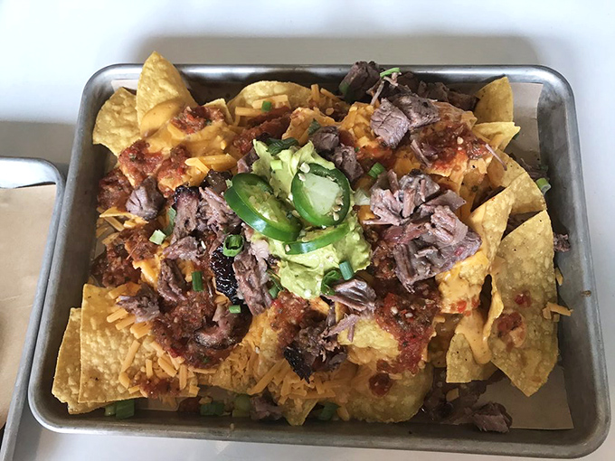 Mount Nacho lives up to its name &ndash; a tectonic plate of tortilla chips supporting geological layers of brisket, cheese, and guacamole.