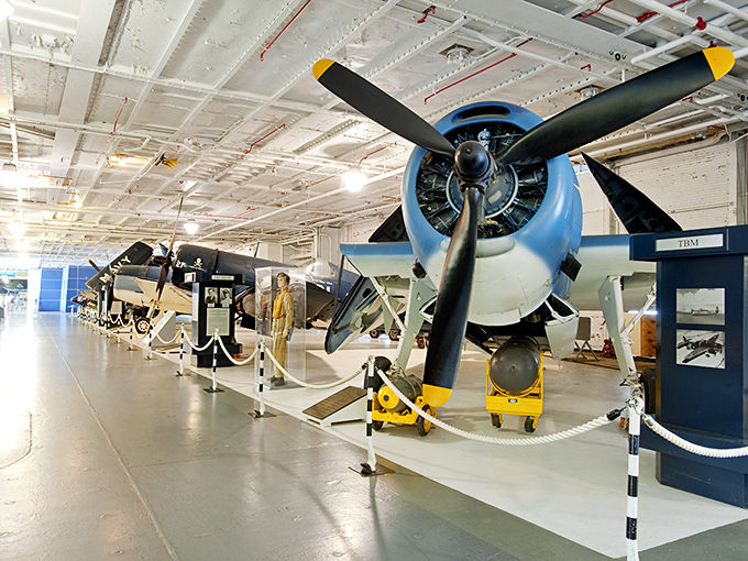 The hangar deck serves as an aviation time tunnel, where propellers from the past keep company with the jets of tomorrow.