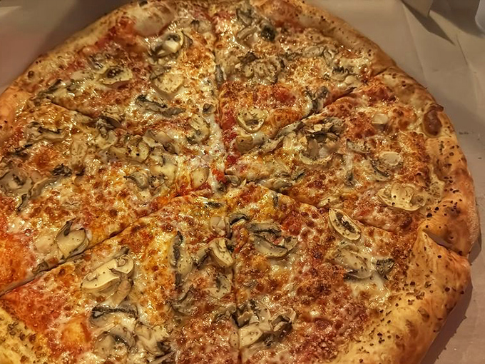 Mushroom lovers, rejoice! This fungi-forward slice proves that sometimes the meatless option is the one that makes you weak in the knees.