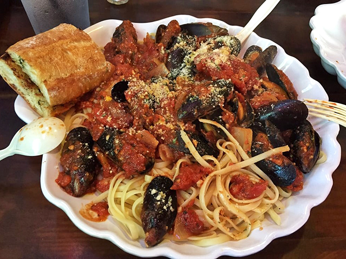 Mussels marinara that could make an Italian grandmother nod in approval. Pasta, seafood, and sauce in perfect harmony.