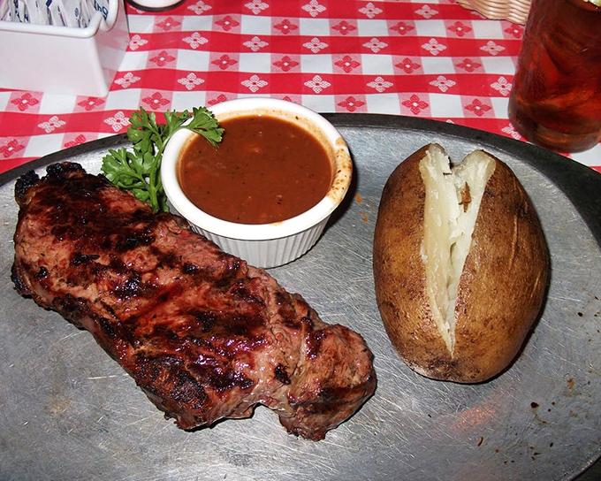 A steak, a spud, and sauce&mdash;the holy trinity of steakhouse perfection. Simple pleasures executed with reverence.