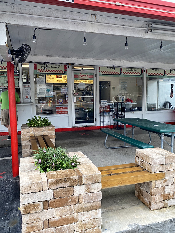The outdoor seating area&mdash;where brick planters and picnic tables create the perfect stage for the main event: the food.