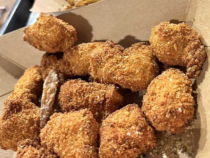 Golden-fried nuggets with a perfectly crispy exterior &ndash; the supporting cast that steals scenes from the headlining hot dogs.