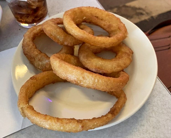 These onion rings aren't just side dishes&mdash;they're golden halos of happiness. Crispy, substantial, and worthy of their own fan club.