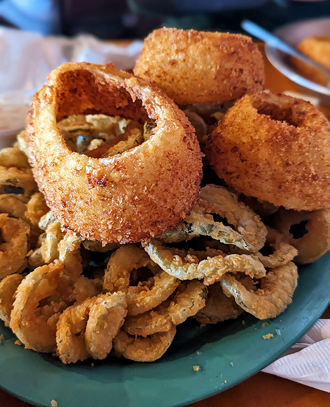 These aren't just onion rings&mdash;they're golden halos of happiness. Crispy, substantial, and demanding to be eaten while still hot.