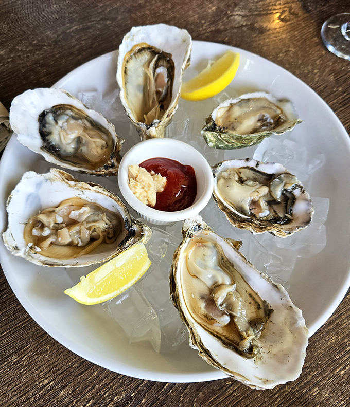 Oysters arranged like a delicious clock face, telling you it's officially time to indulge. Fresh, briny perfection on the half shell.