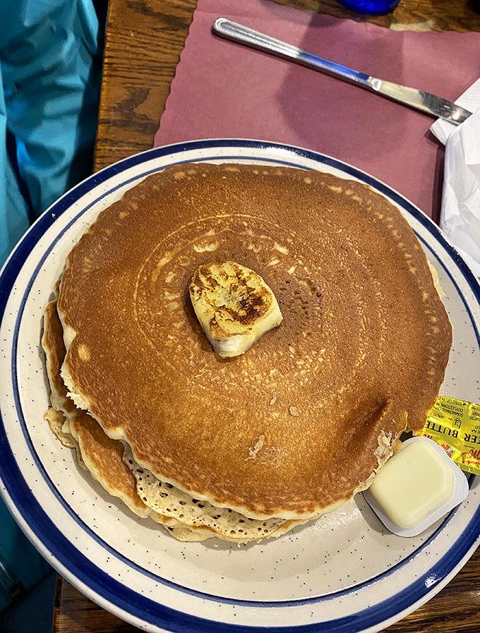 Behold the pancake in its natural habitat&mdash;perfectly round, golden-brown, and ready to absorb approximately half a bottle of syrup.