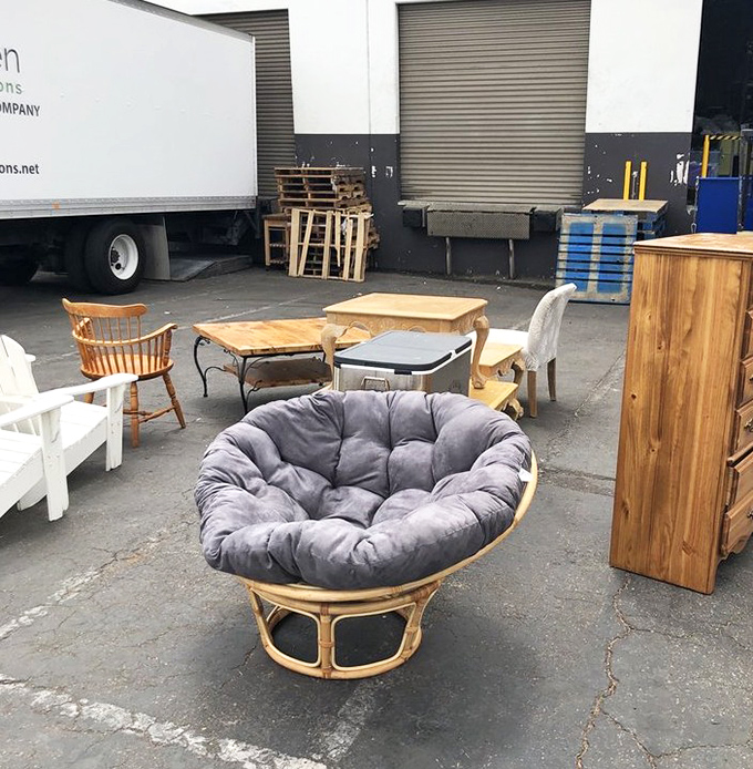 The papasan chair&mdash;that iconic '70s comfort pod&mdash;holds court among an eclectic assortment of furniture awaiting adoption. Instant dorm room upgrade, anyone?
