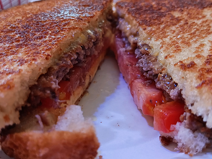 The patty melt reveals its glorious cross-section&mdash;perfectly grilled bread giving way to seasoned beef and melted cheese in a harmony that needs no explanation.