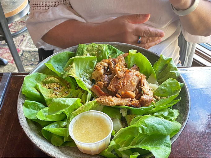 A salad that actually excites! Fresh greens playing host to what appears to be perfectly seasoned protein&mdash;proof that healthy choices needn't be punishment.