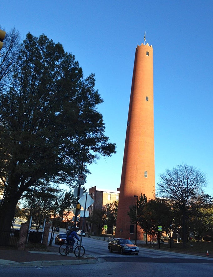Sunset gives the tower's bricks that perfect Instagram filter glow. No wonder cyclists pause mid-commute—some views demand a moment of appreciation.