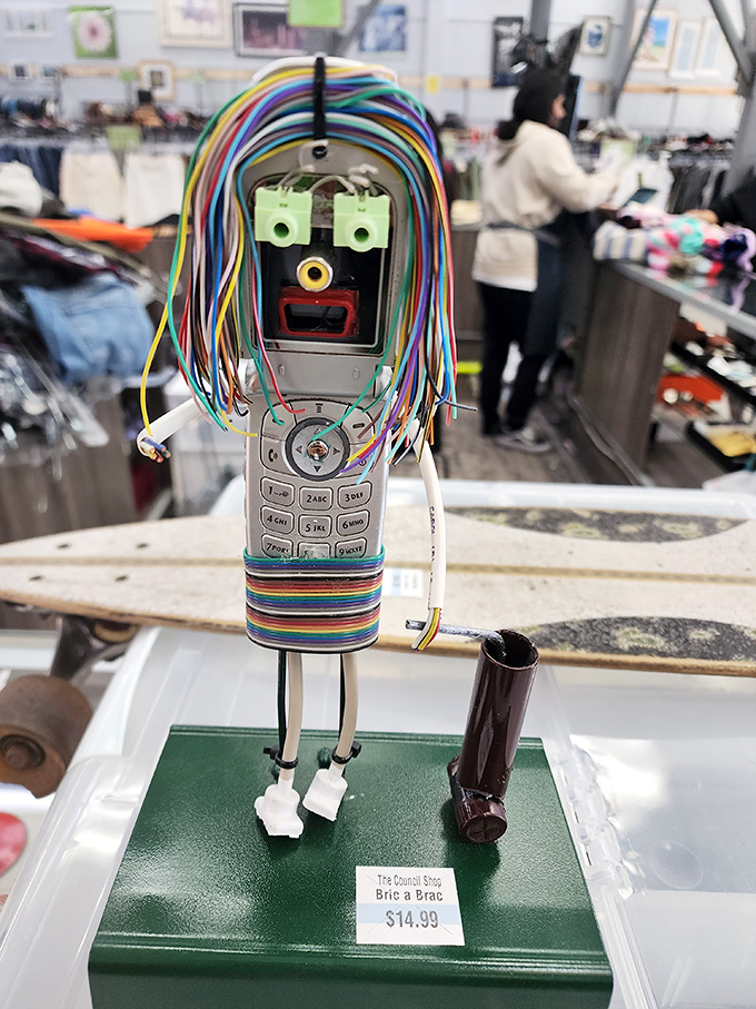 Not just a phone, but a whimsical art piece! This colorful wire creation transforms obsolete technology into conversation-starting sculpture.