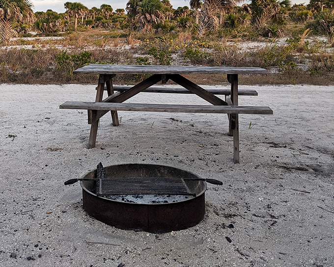 Gourmet dining, island style. This beachfront table offers million-dollar views with your hot dogs and s'mores.