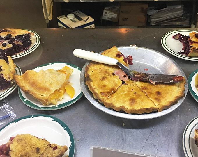 The pie lineup at Cooky's is like a family reunion where everyone actually gets along&mdash;fruit pies, cream pies, all waiting for their moment of glory.