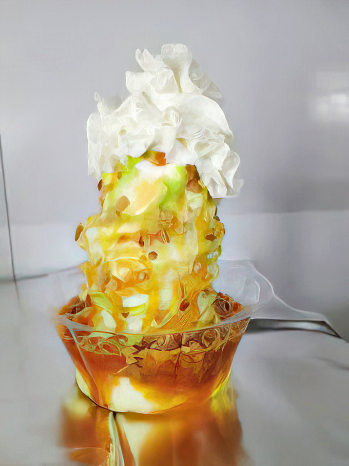 Dessert architecture that defies both gravity and restraint. This towering frozen creation makes a compelling argument for eating dessert first, second, and possibly third.