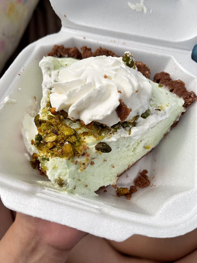 Pistachio cream pie with a crown of whipped cream—like the dessert equivalent of finding money in an old jacket pocket.