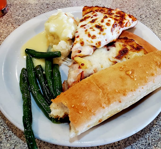 Pizza, mashed potatoes, green beans, and garlic bread &ndash; the Mount Rushmore of comfort food assembled on one glorious plate.