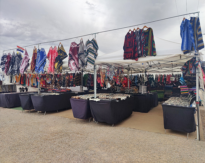 These aren't your college dorm ponchos&mdash;vibrant, handcrafted garments transform the desert marketplace into a textile rainbow.