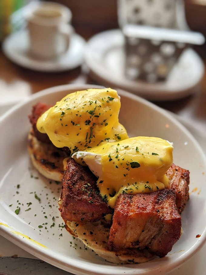 Eggs Benedict gets the pork belly upgrade it deserves. That hollandaise sauce cascading down like a yellow waterfall of happiness would make Julia Child weep.