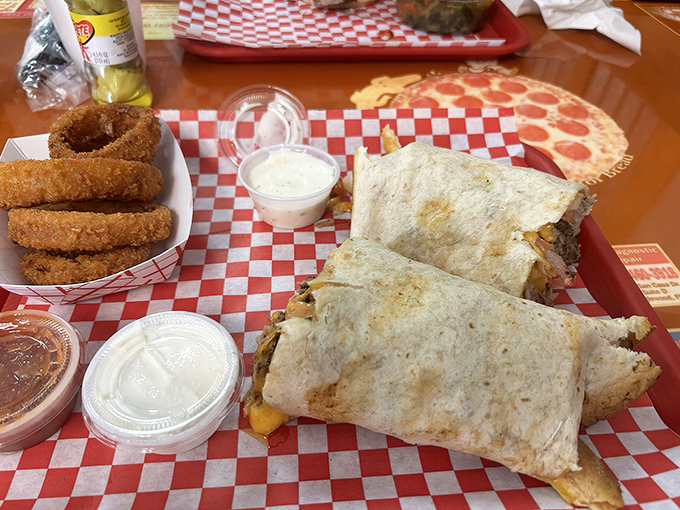 Barbecue innovation: The burrito that bridges Tex and Mex, with crispy onion rings standing guard. Cross-cultural deliciousness at its finest!