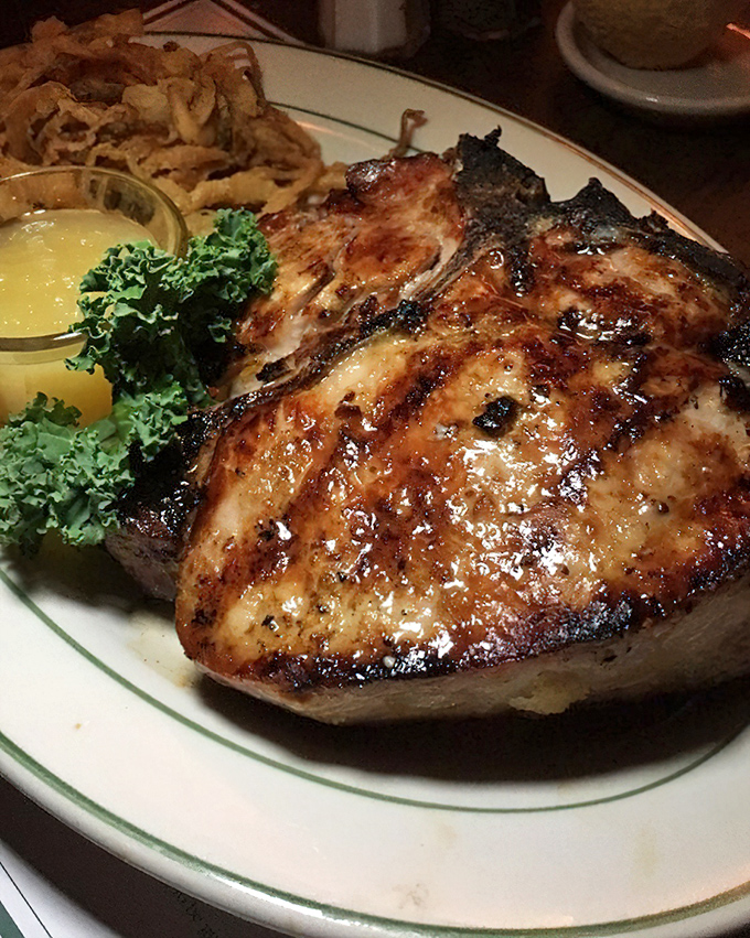 This bone-in pork chop with its perfect grill marks is the kind of dish that makes vegetarians question their life choices.