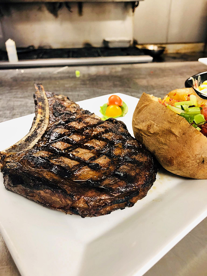 That's not just a pork chop&mdash;it's a monument to meat, complete with perfect grill marks that should be in a museum of culinary achievement.