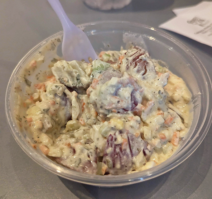 Potato salad: the unsung hero of sandwich accompaniments. Creamy, substantial, and patiently waiting in the wings while the hoagies take center stage.